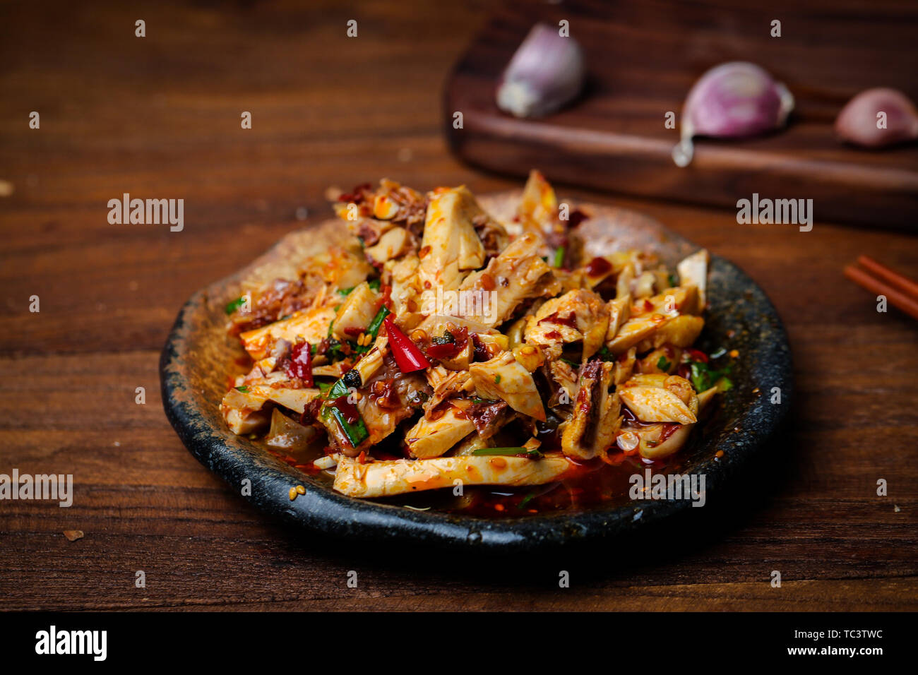 drooling chicken, stick chicken Stock Photo - Alamy