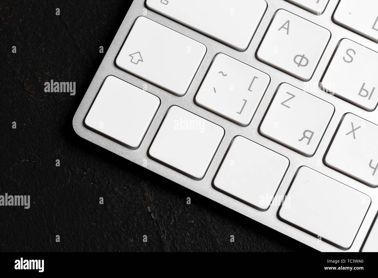 Office table with keyboard Isolated on black background Stock Photo - Alamy