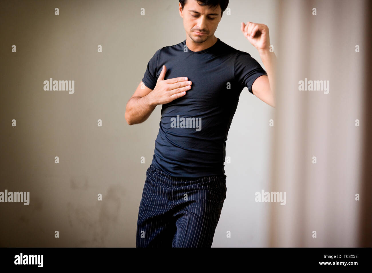 Portrait of a man dancing alone Stock Photo - Alamy