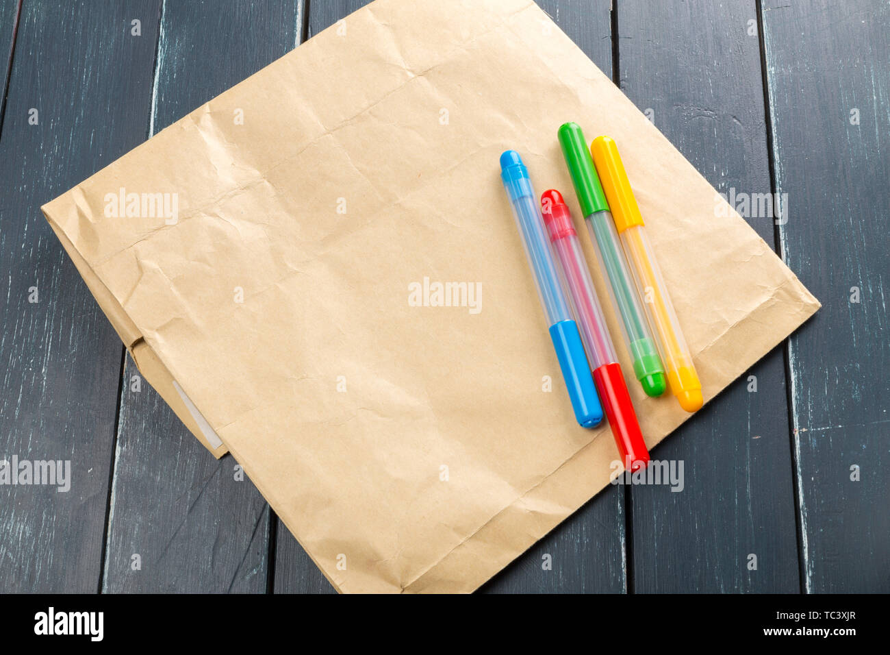 clean sheets on table with markers Stock Photo - Alamy
