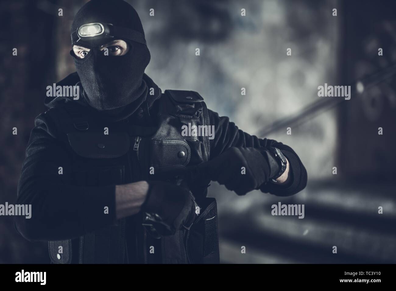 Special Forces Operation. Caucasian Policeman Wearing Black Mask and ...