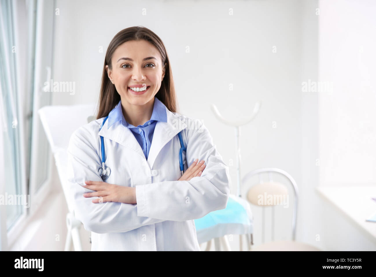 Beautiful female gynecologist in clinic Stock Photo - Alamy