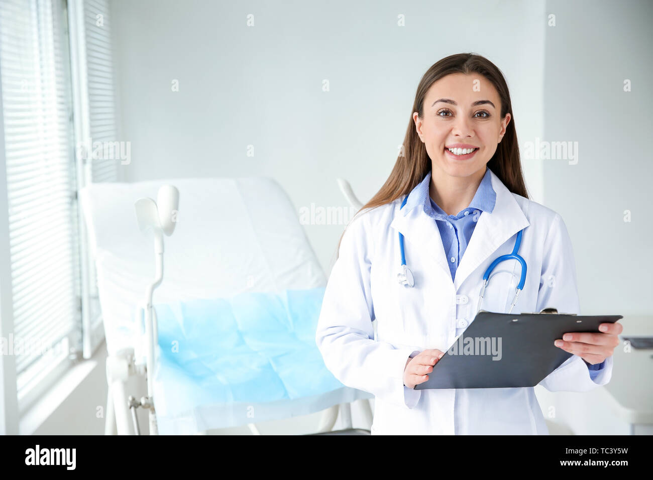 Beautiful female gynecologist in clinic Stock Photo - Alamy