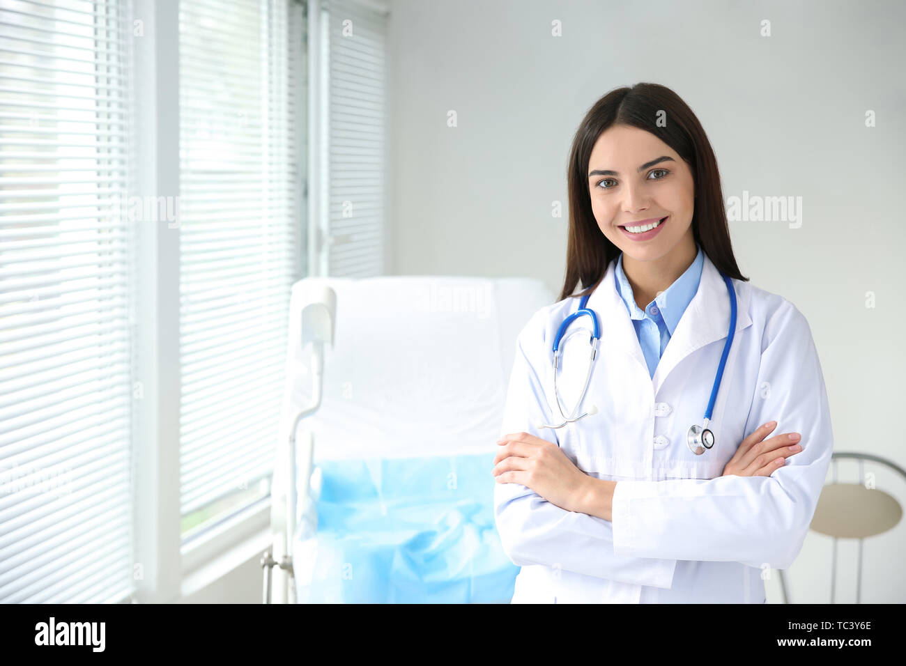 Beautiful female gynecologist in clinic Stock Photo - Alamy