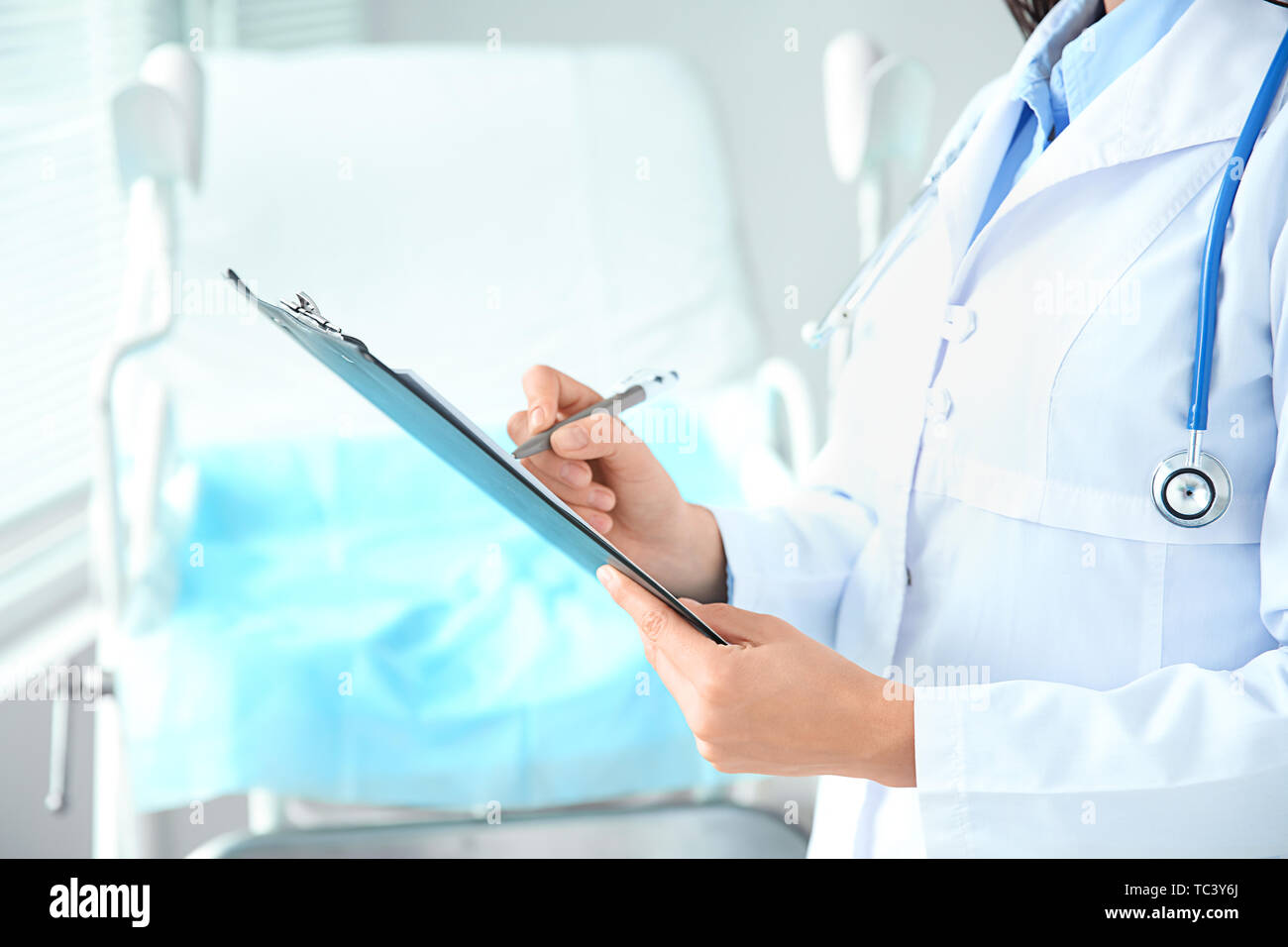 Beautiful female gynecologist in clinic Stock Photo - Alamy