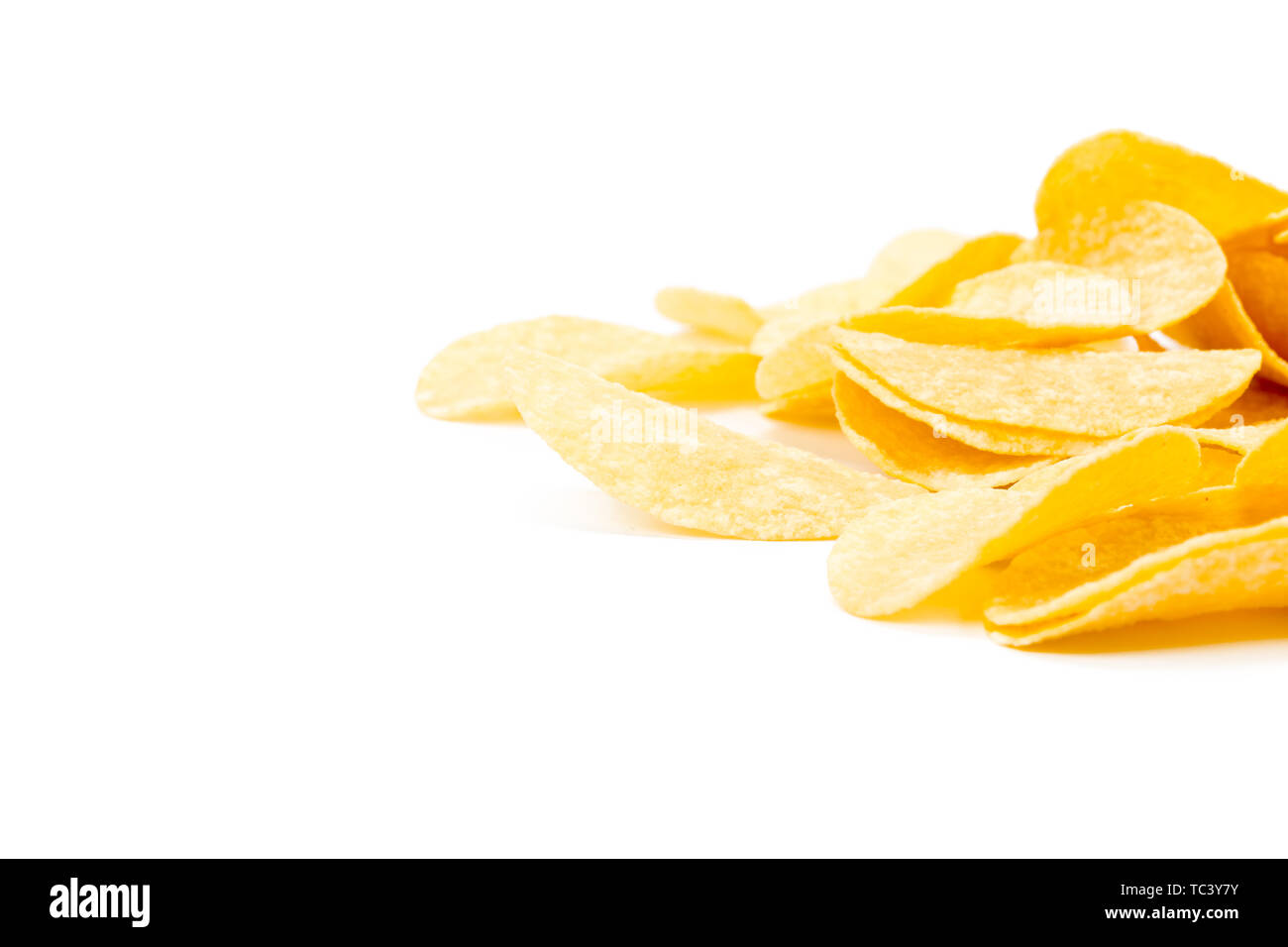 yellow potato chips isolated on white Stock Photo - Alamy