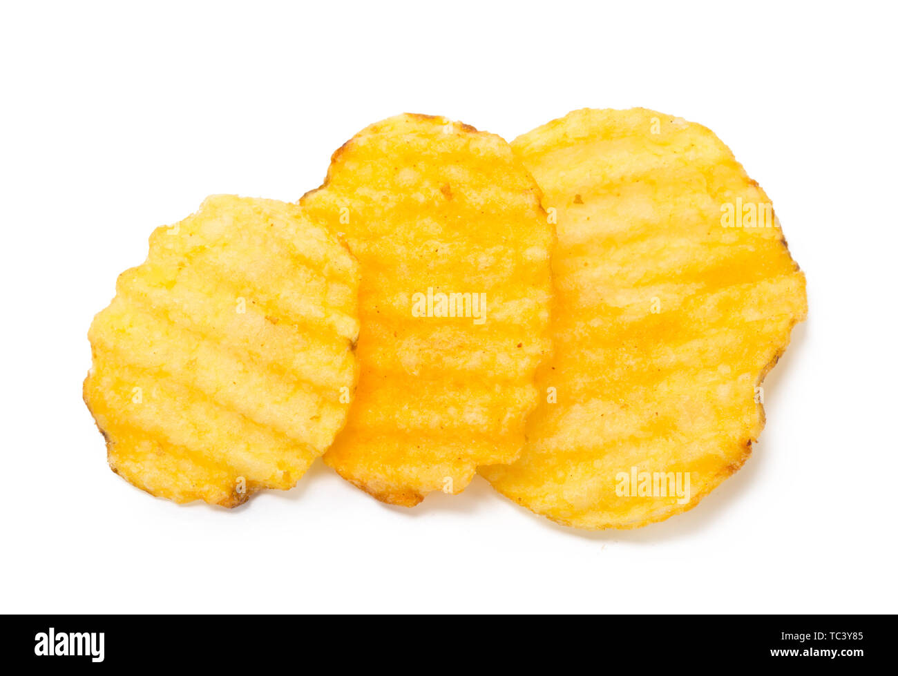 yellow potato chips isolated on white Stock Photo - Alamy