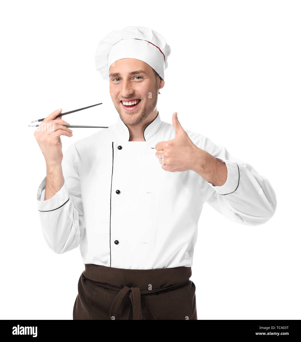 Handsome male chef with chopsticks on white background Stock Photo - Alamy