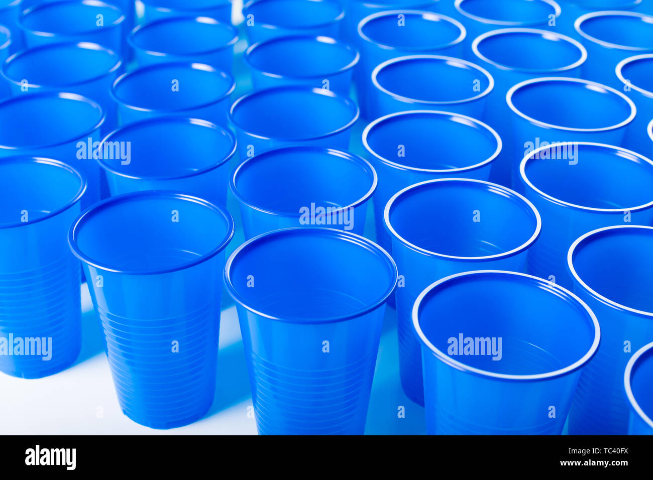 blue disposable plastic glasses Stock Photo - Alamy