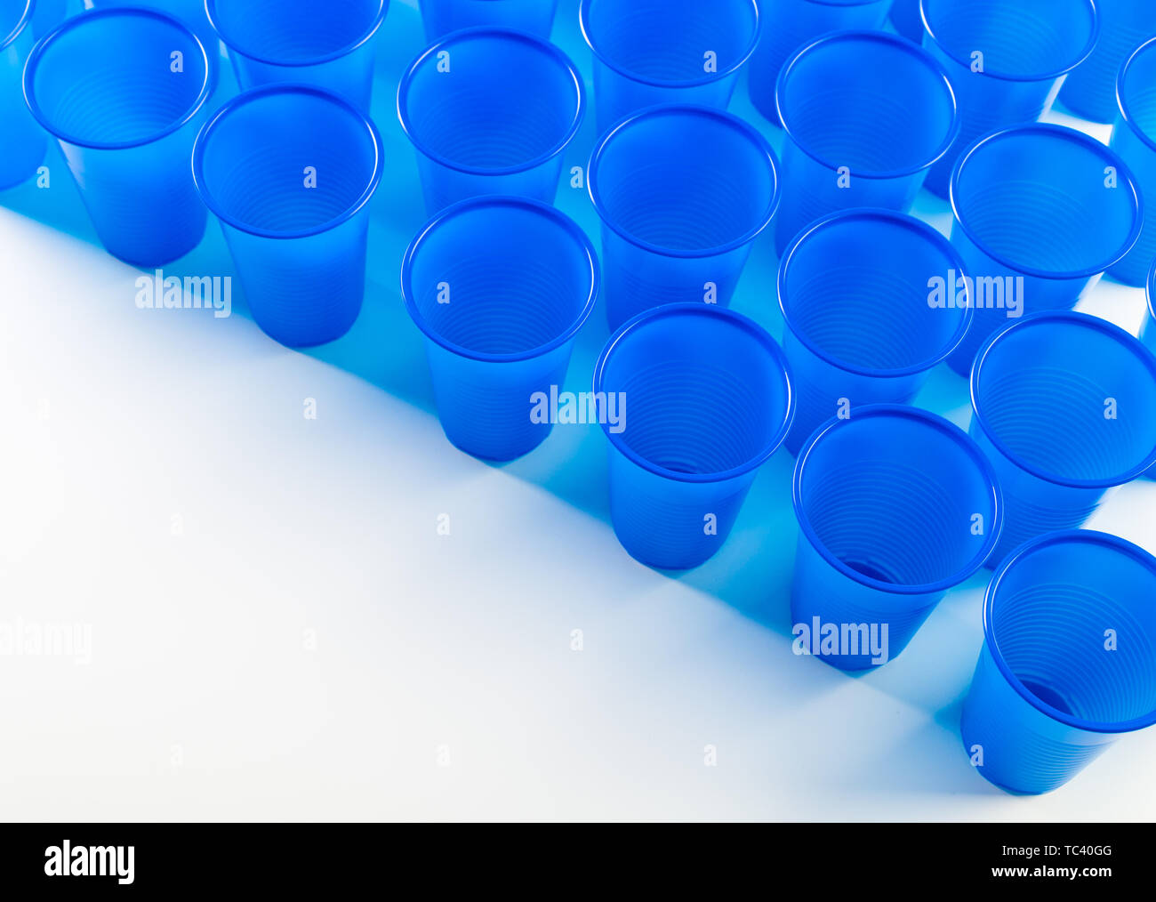 blue disposable plastic glasses Stock Photo - Alamy