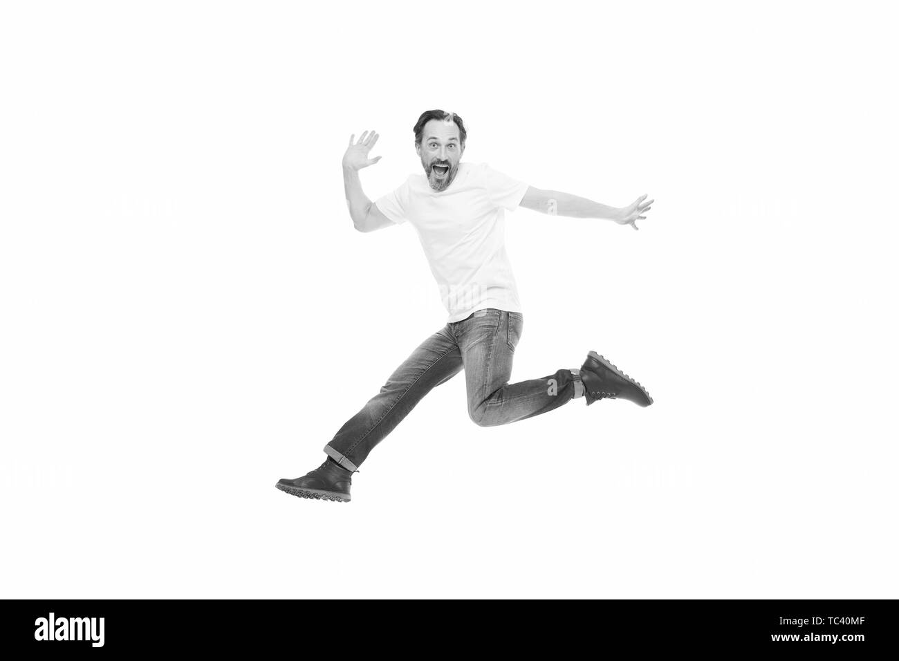 Explosion of positive emotions. Man excited jumping. Mature charismatic ...