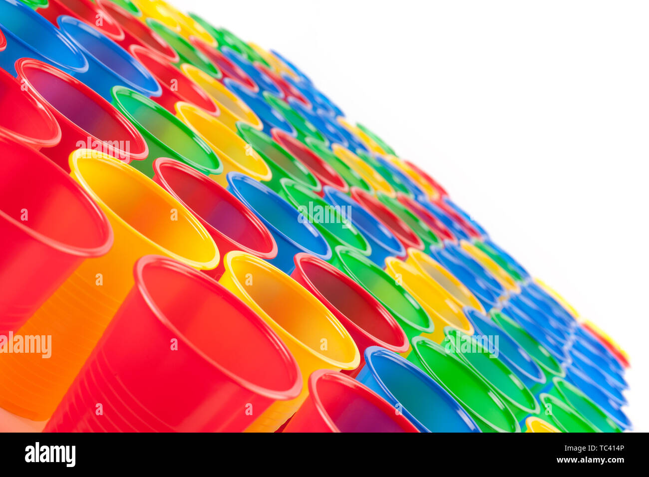Multicolor plastic glasses isolated on white background Stock Photo - Alamy