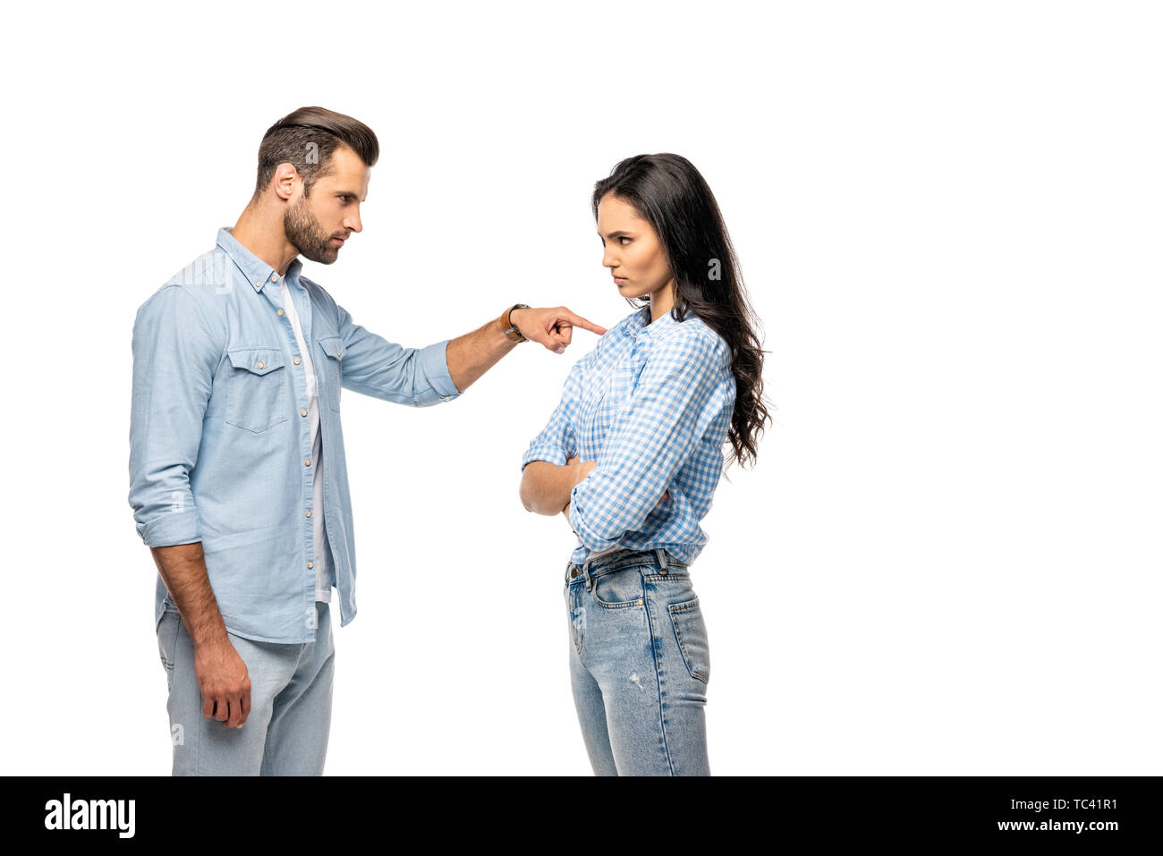angry man pointing with finger at young woman Isolated On White Stock ...