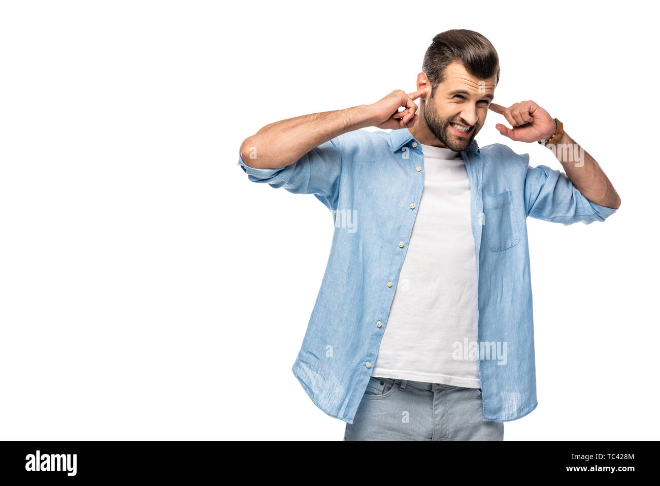 Man plugging ears hi-res stock photography and images - Alamy