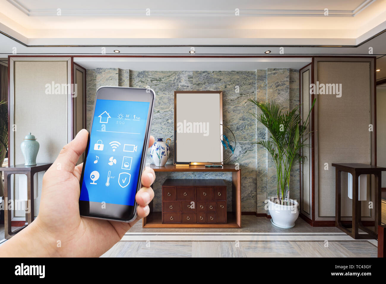 smart phone with smart home with modern living room Stock Photo - Alamy