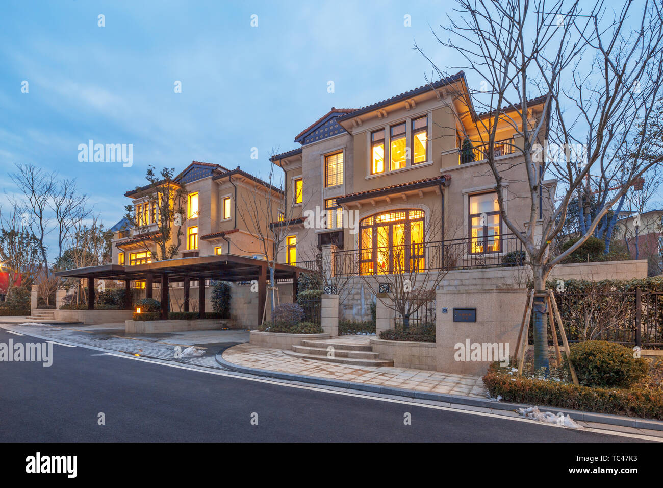 Houses in modern villa at night Stock Photo - Alamy