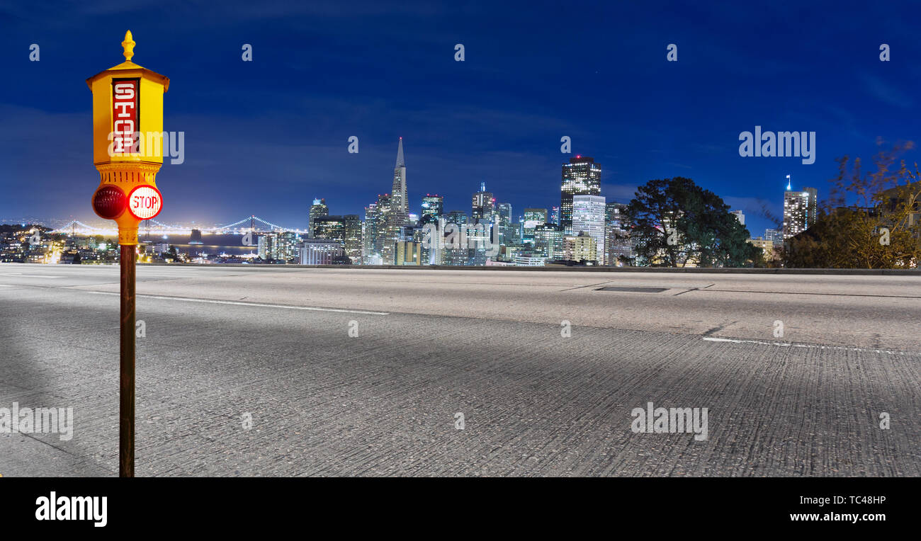 traffic light on asphalt road with cityscape of San Francisco Stock ...