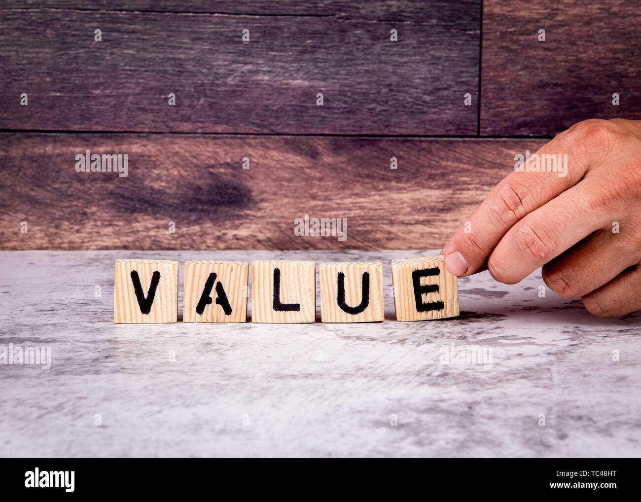 Value. Word from wooden letters Stock Photo - Alamy
