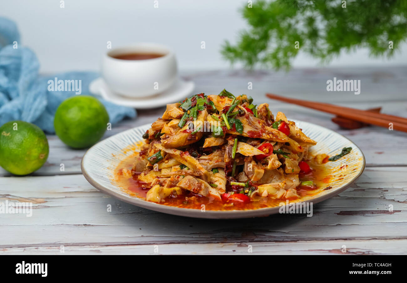 drooling chicken, stick chicken Stock Photo - Alamy