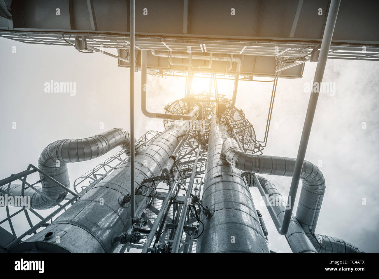 Oil-rig of oilfield day and night Stock Photo - Alamy