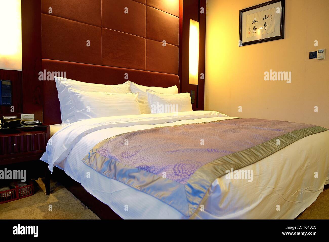 Hotel headboard lights in indoor family blankets hi-res stock ...