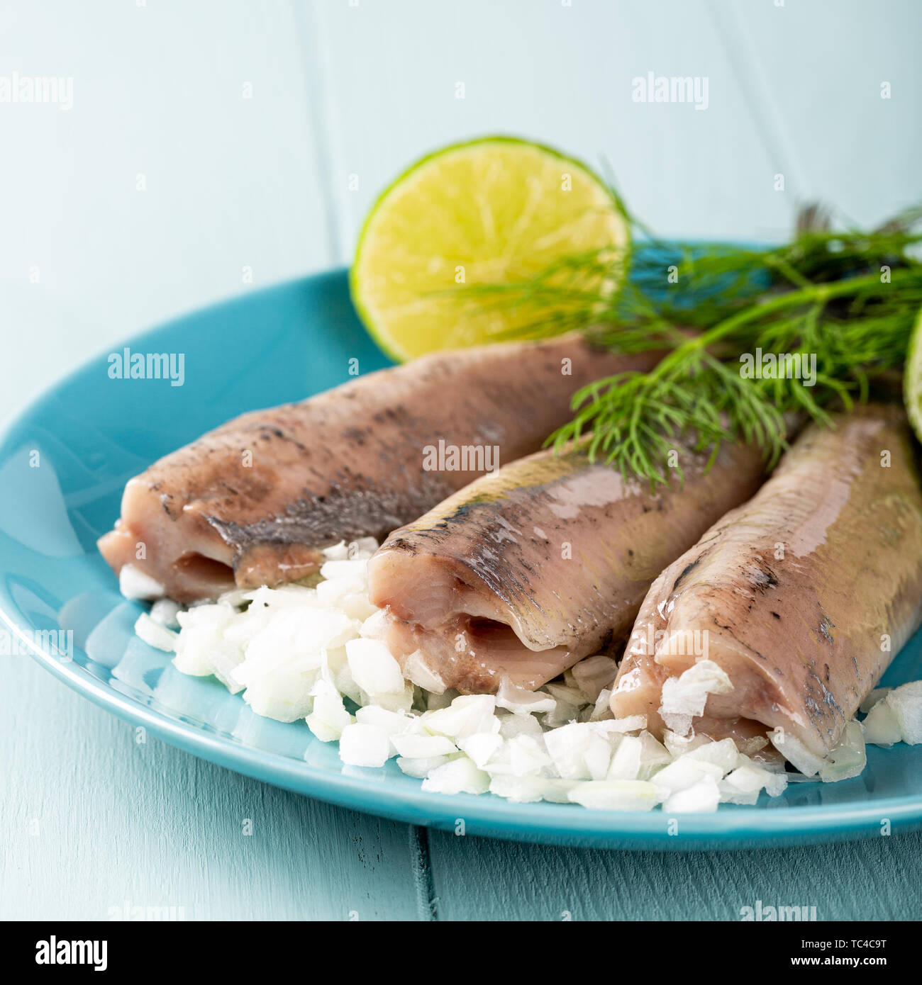 Traditional dutch food herring fish Stock Photo - Alamy