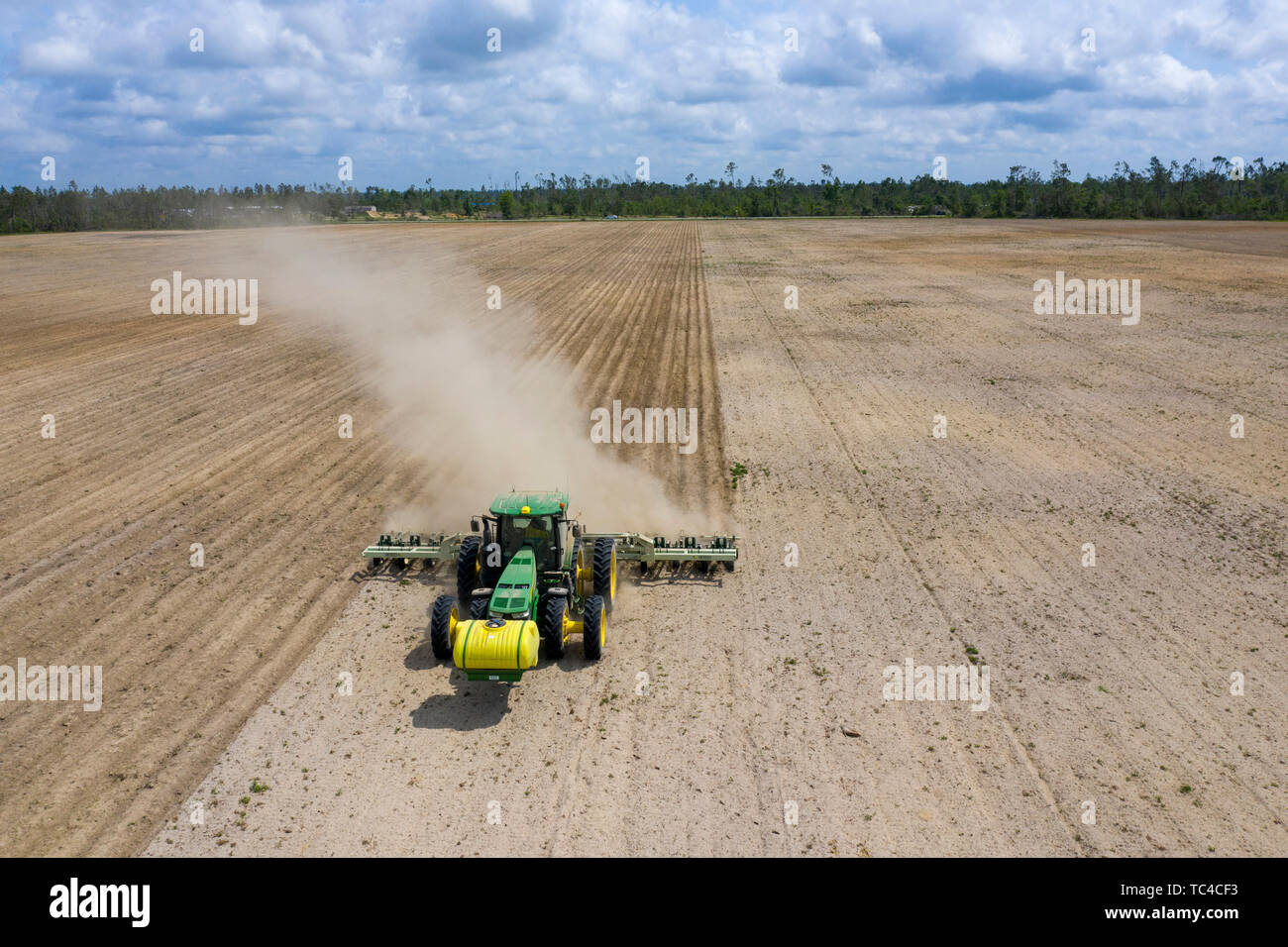 Chipola Park, Florida - A farmer prepares a field in the Florida ...