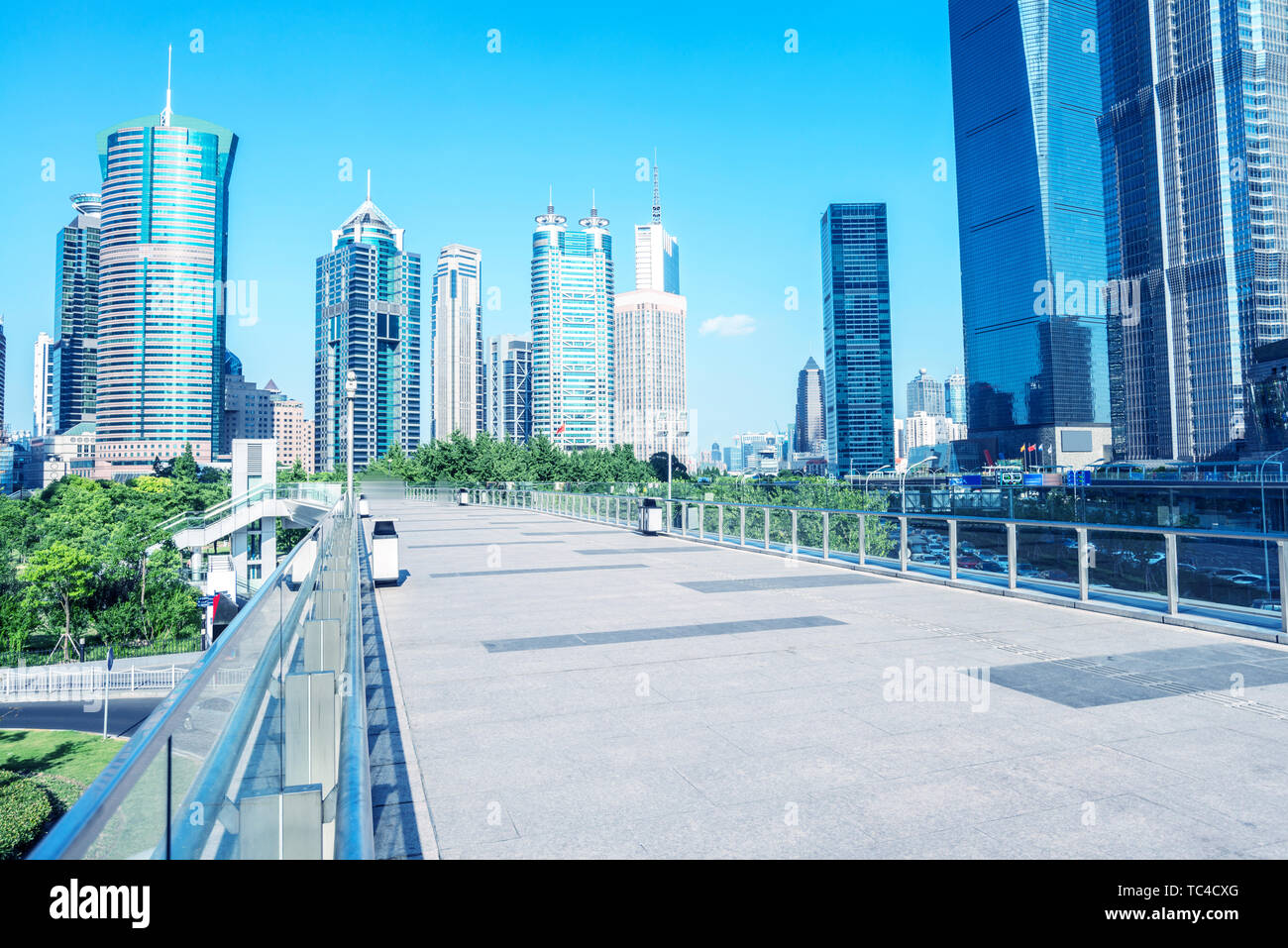 modern office buildings in shanghai from empty footpath Stock Photo - Alamy