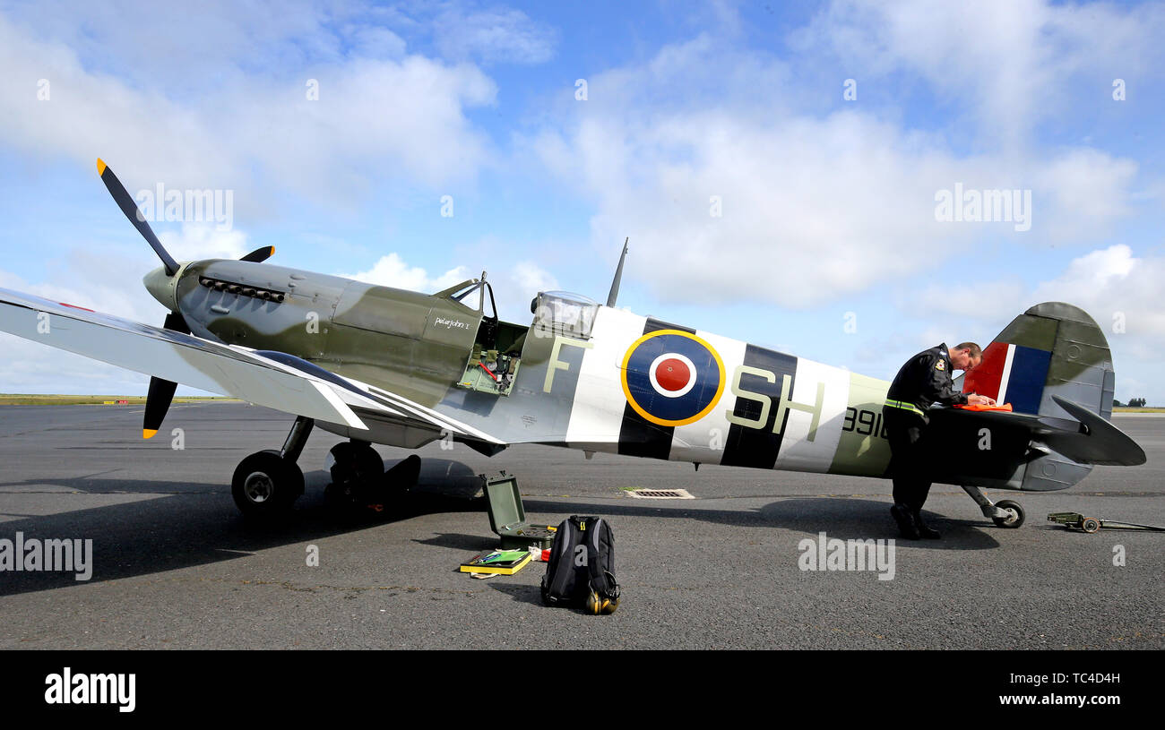 A RAF Spitfire which flew during the D-Day invasion is prepared at Le ...