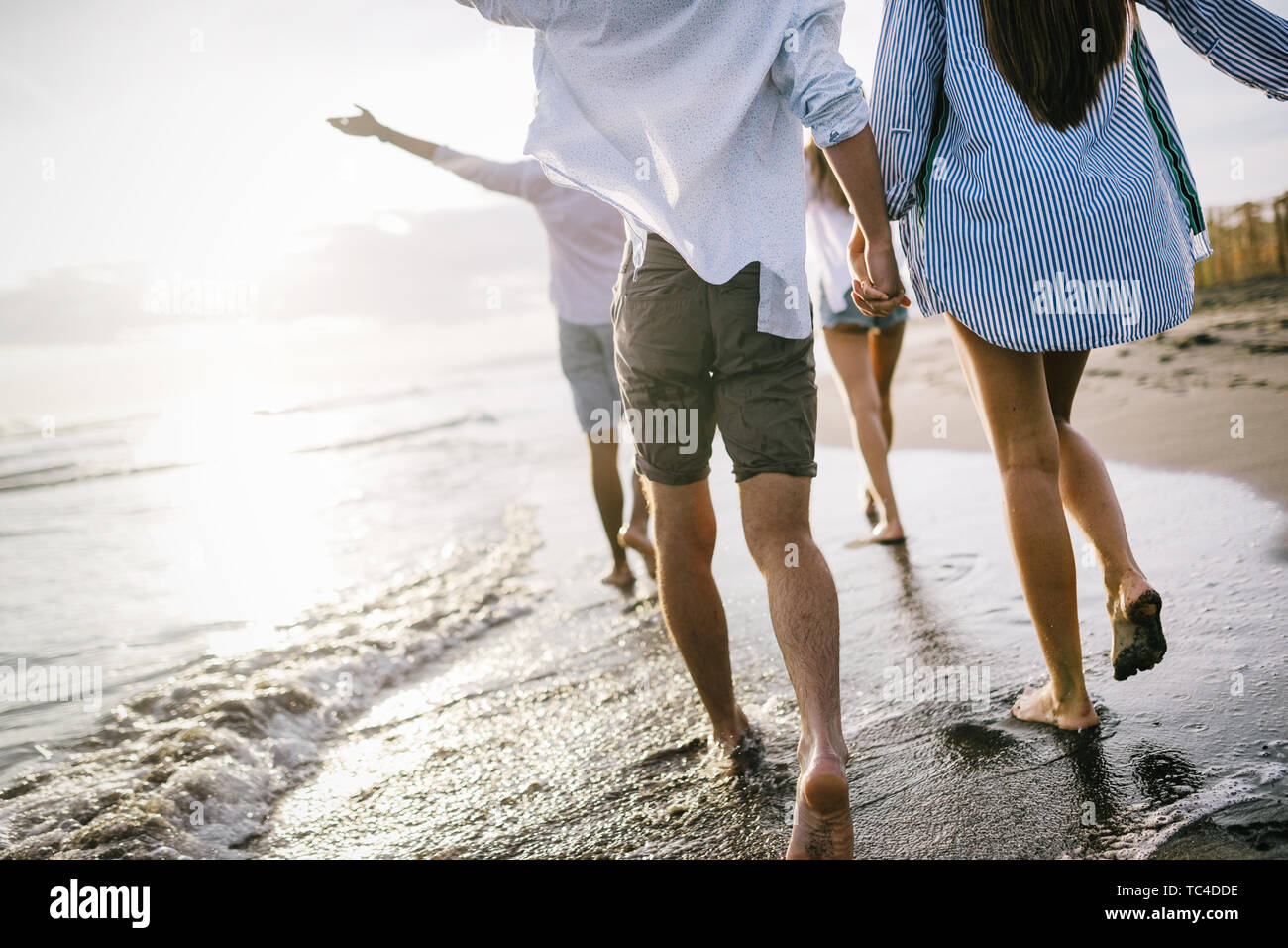 Female friends beach sunset hi-res stock photography and images - Alamy