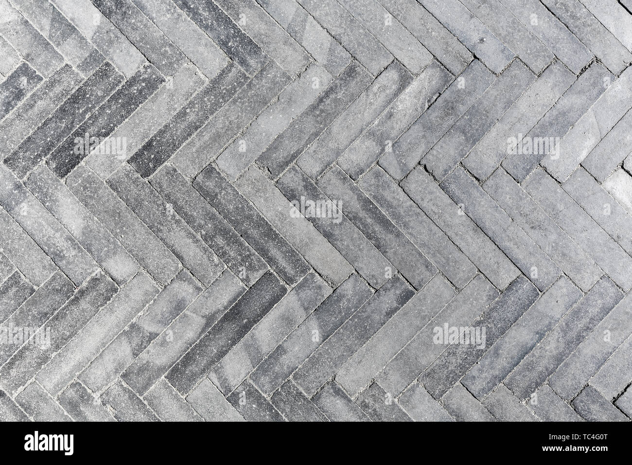 Grey brick pavement texture material Stock Photo - Alamy