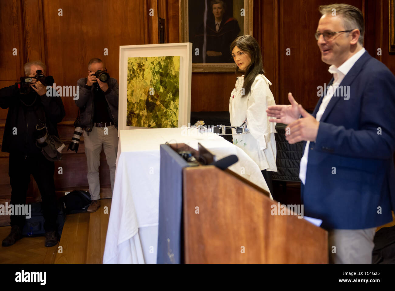 Creator Aidan Meller with Ai-Da at a press conference unveiling the ...