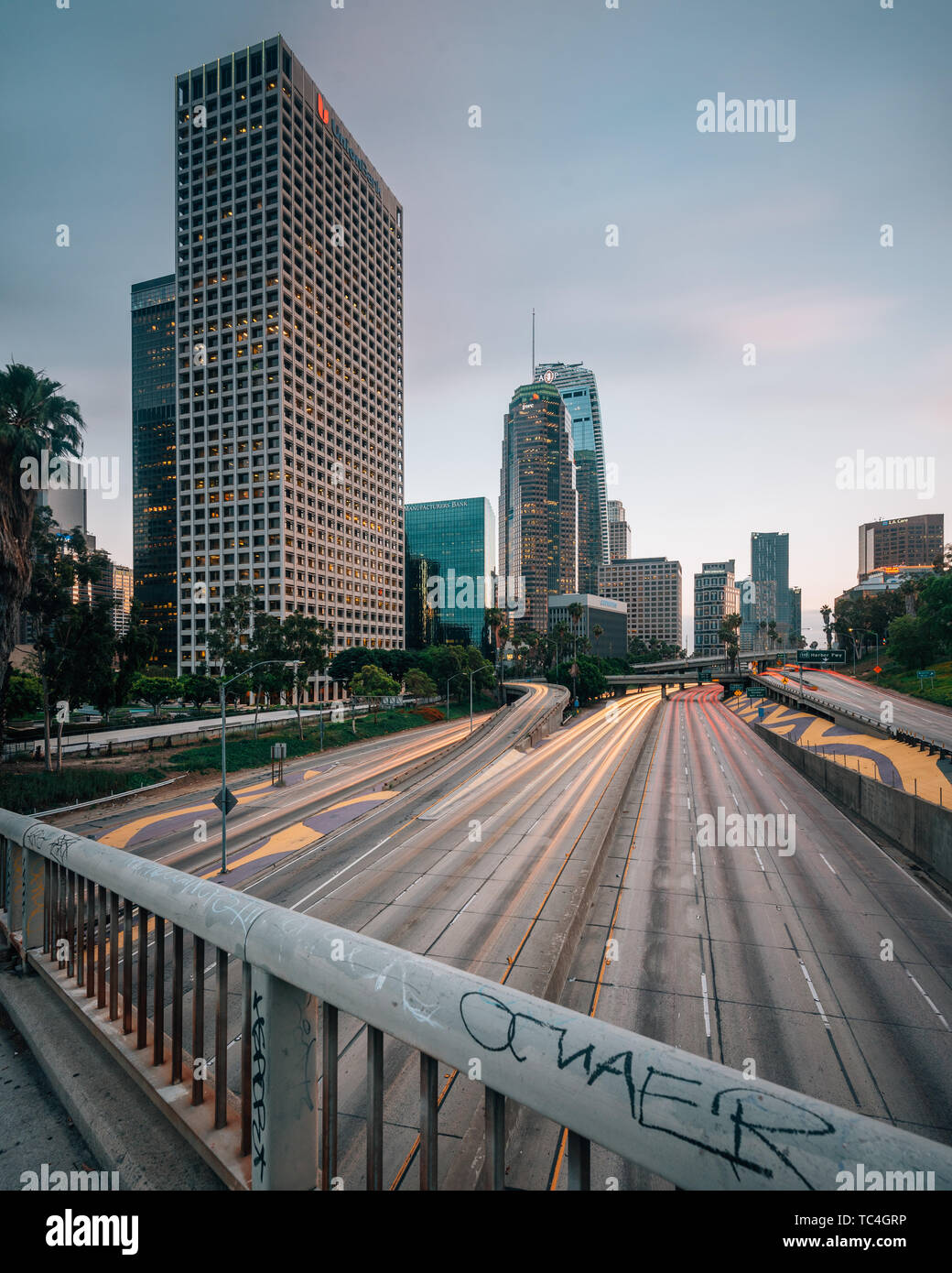 Los Angeles skyline cityscape long exposure of the 110 Freeway, in ...