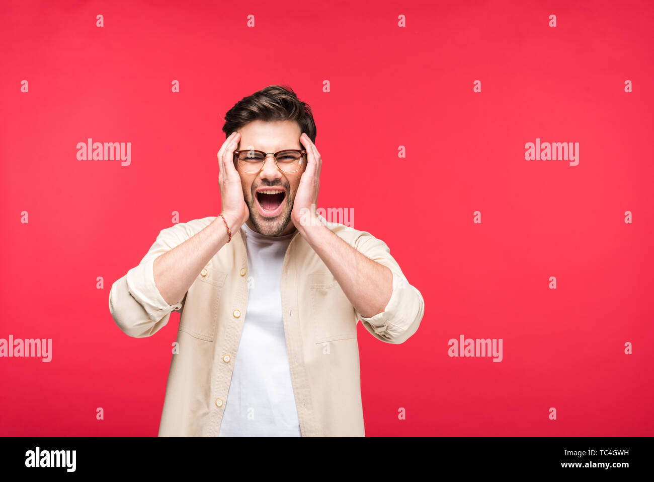 Person with hands on head screaming hi-res stock photography and images ...