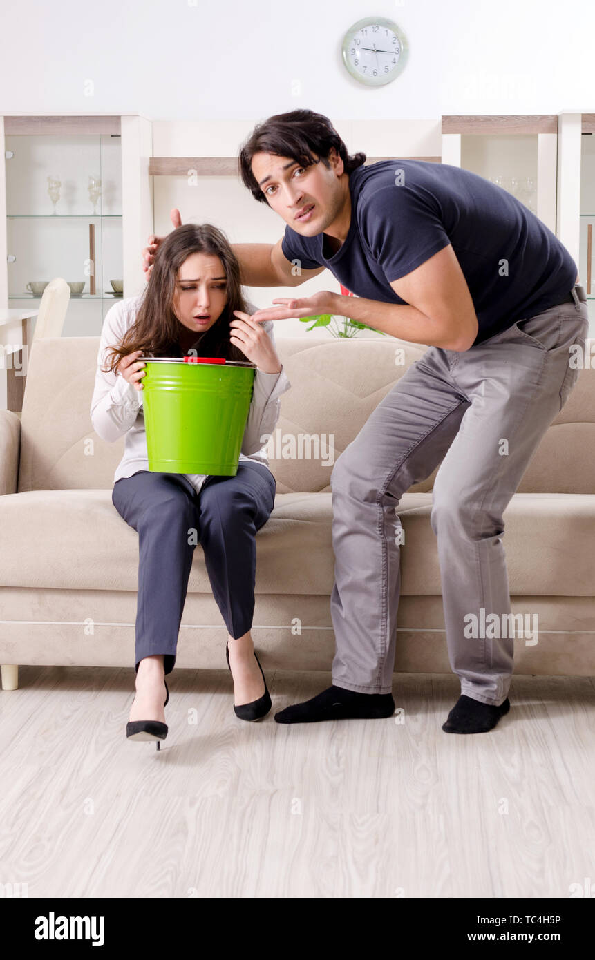 Young wife suffering from sick stomach and vomiting Stock Photo - Alamy
