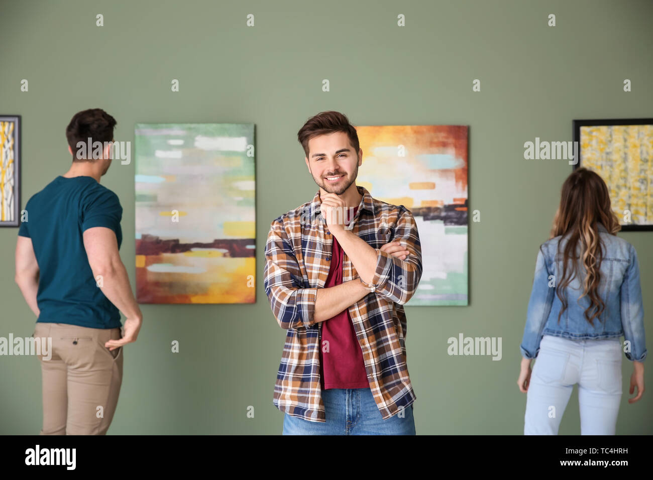 People at exhibition in modern art gallery Stock Photo - Alamy