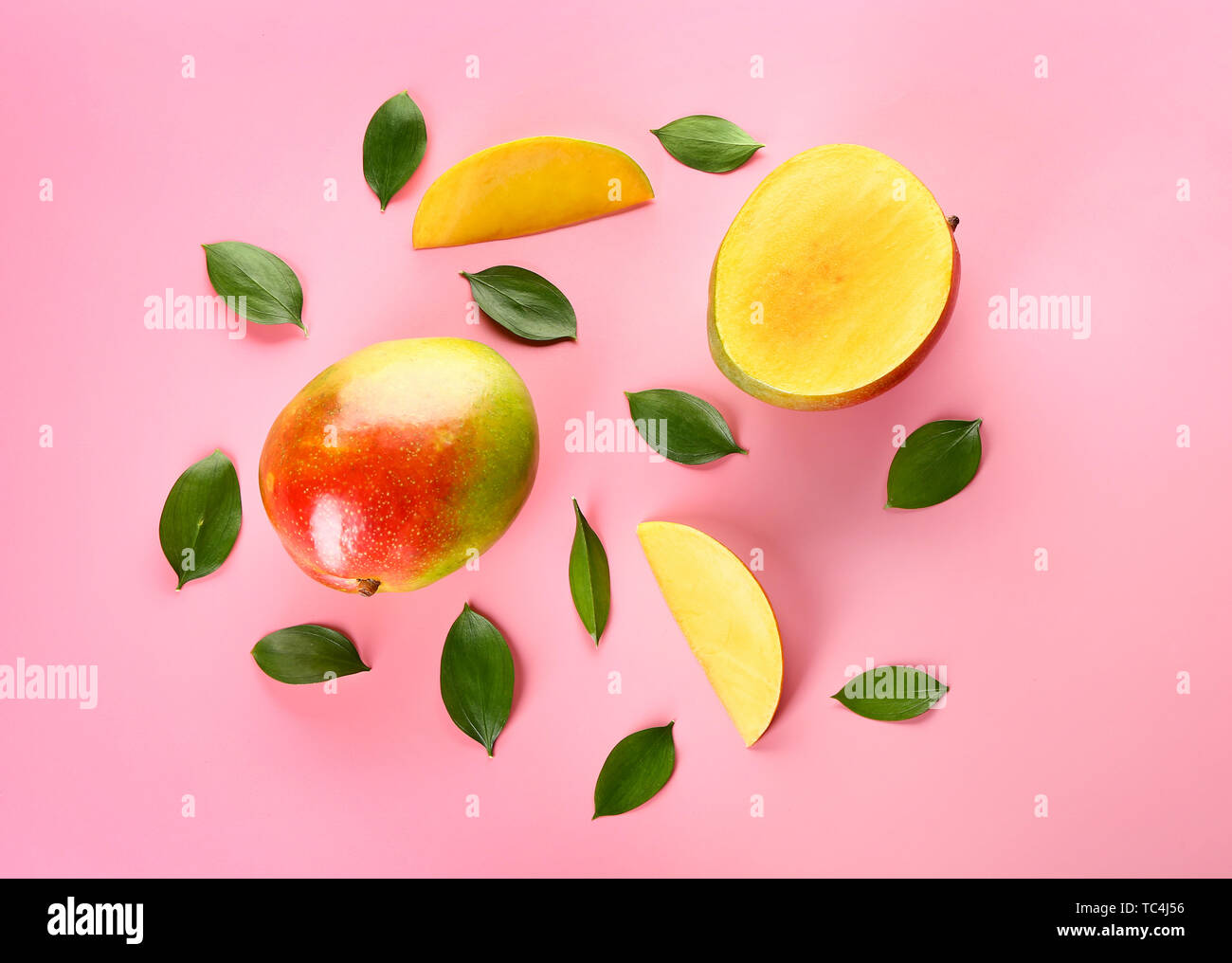 Tasty fresh mango on color background Stock Photo - Alamy