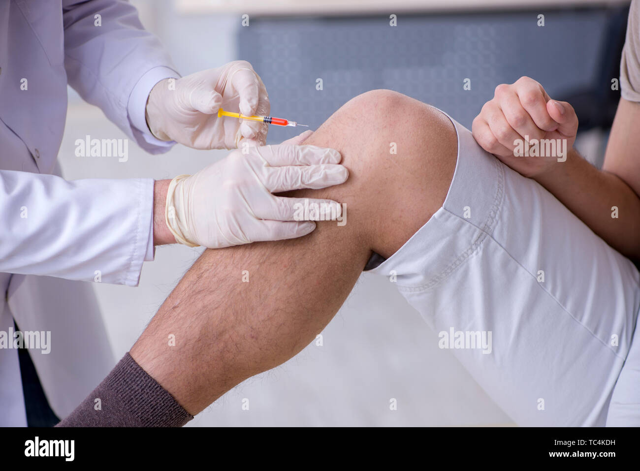 Male patient visitng doctor hi-res stock photography and images - Alamy
