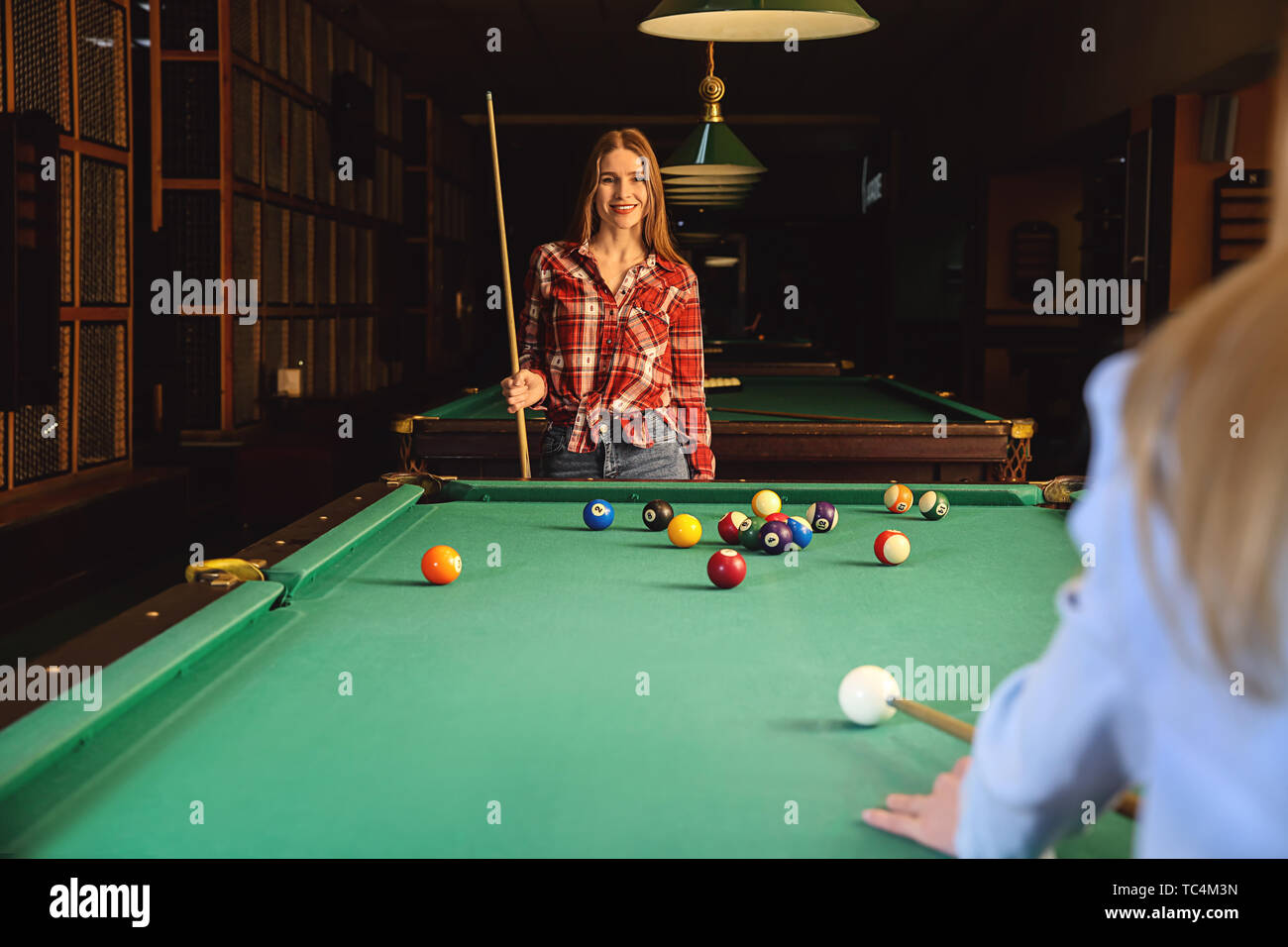 Pool table cue women hi-res stock photography and images - Alamy
