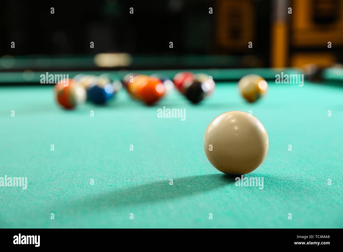 Billiard ball on table in club Stock Photo - Alamy