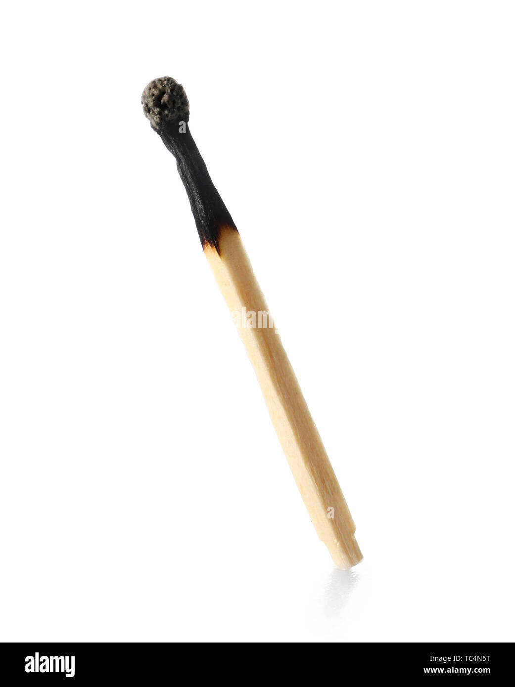 Burnt out match on white background Stock Photo - Alamy