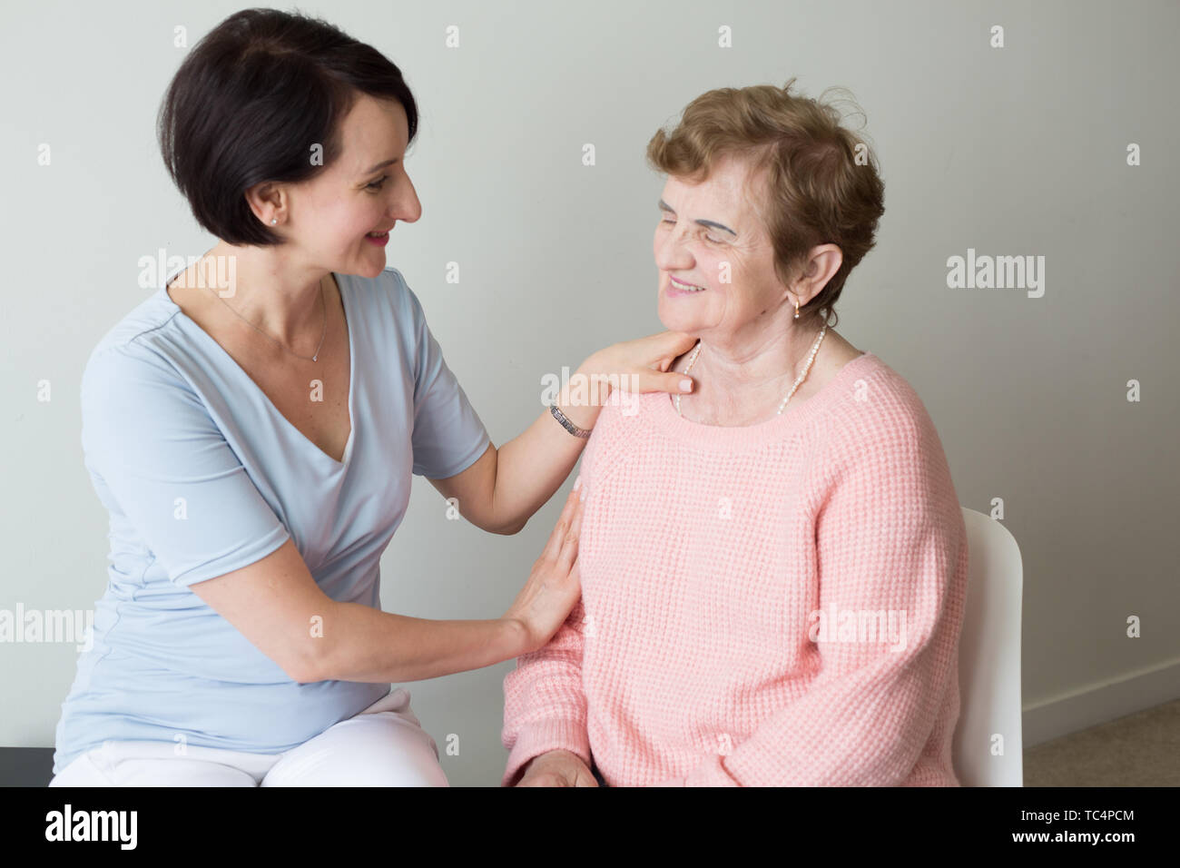 Hand shoulder hug hi-res stock photography and images - Alamy