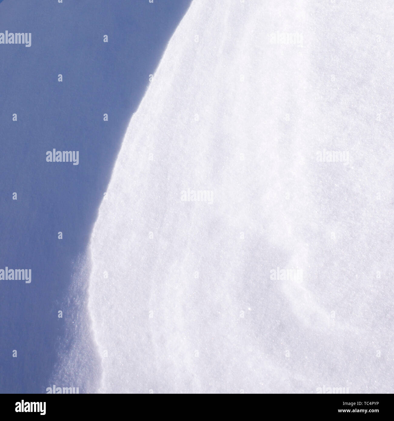 winter snow surface with patterns created by wind and other natural ...