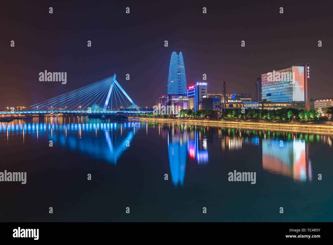 The night view of the Yong River in Ningbo, in the distance is the Bund ...
