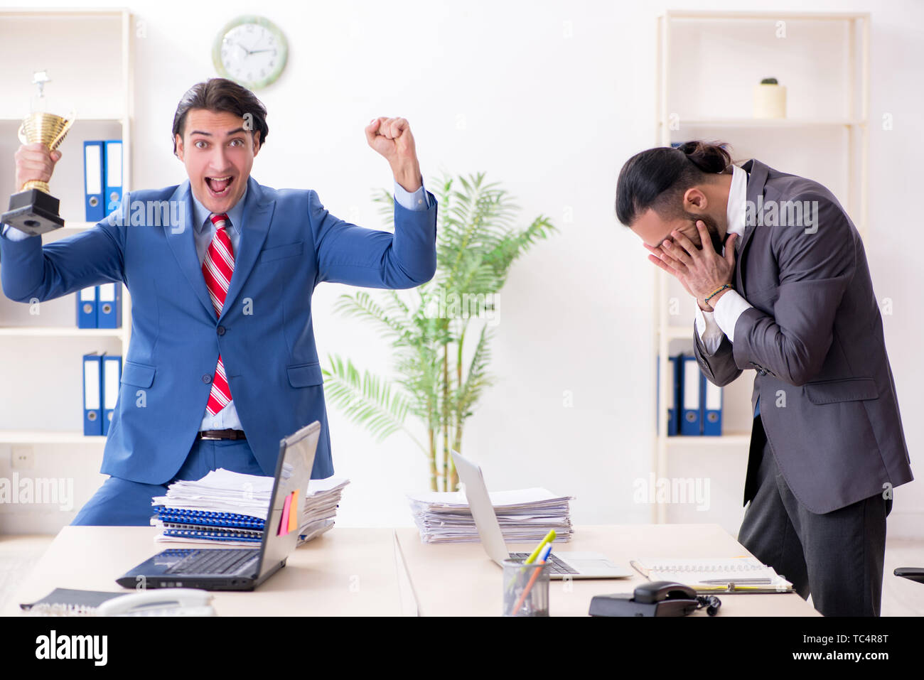 Two male colleagues in the office Stock Photo - Alamy