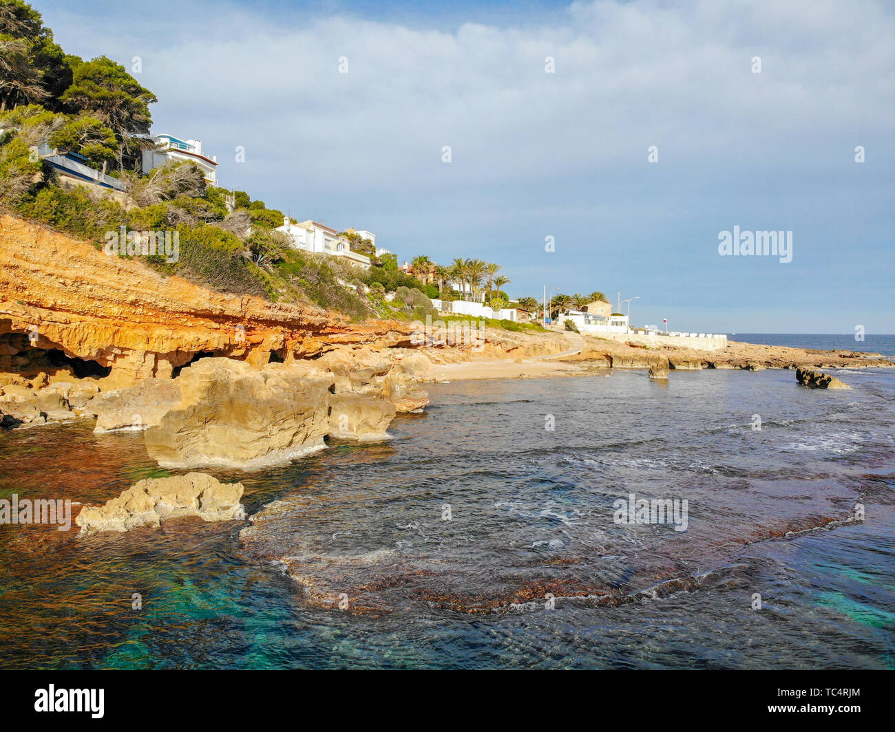 Aerial view of Las Rotas rocky beach in Denia, Spain at sunset Stock ...