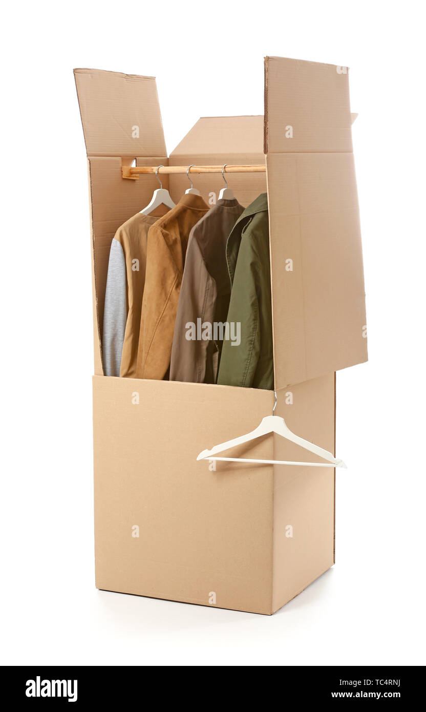 Wardrobe box with clothes on white background Stock Photo - Alamy