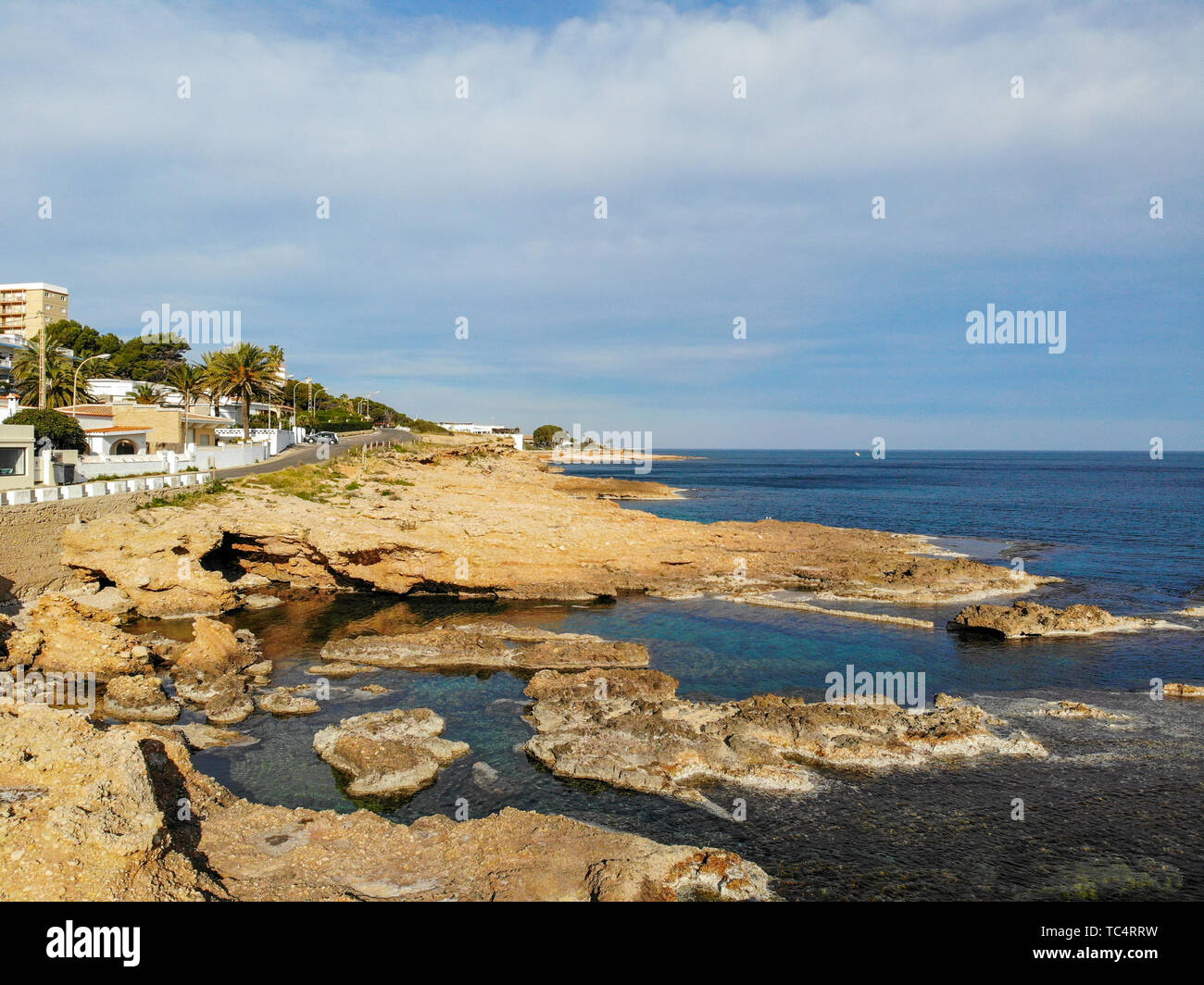 Denia Alicante Las rotas rocky beach in Spain and San Antonio Cape ...
