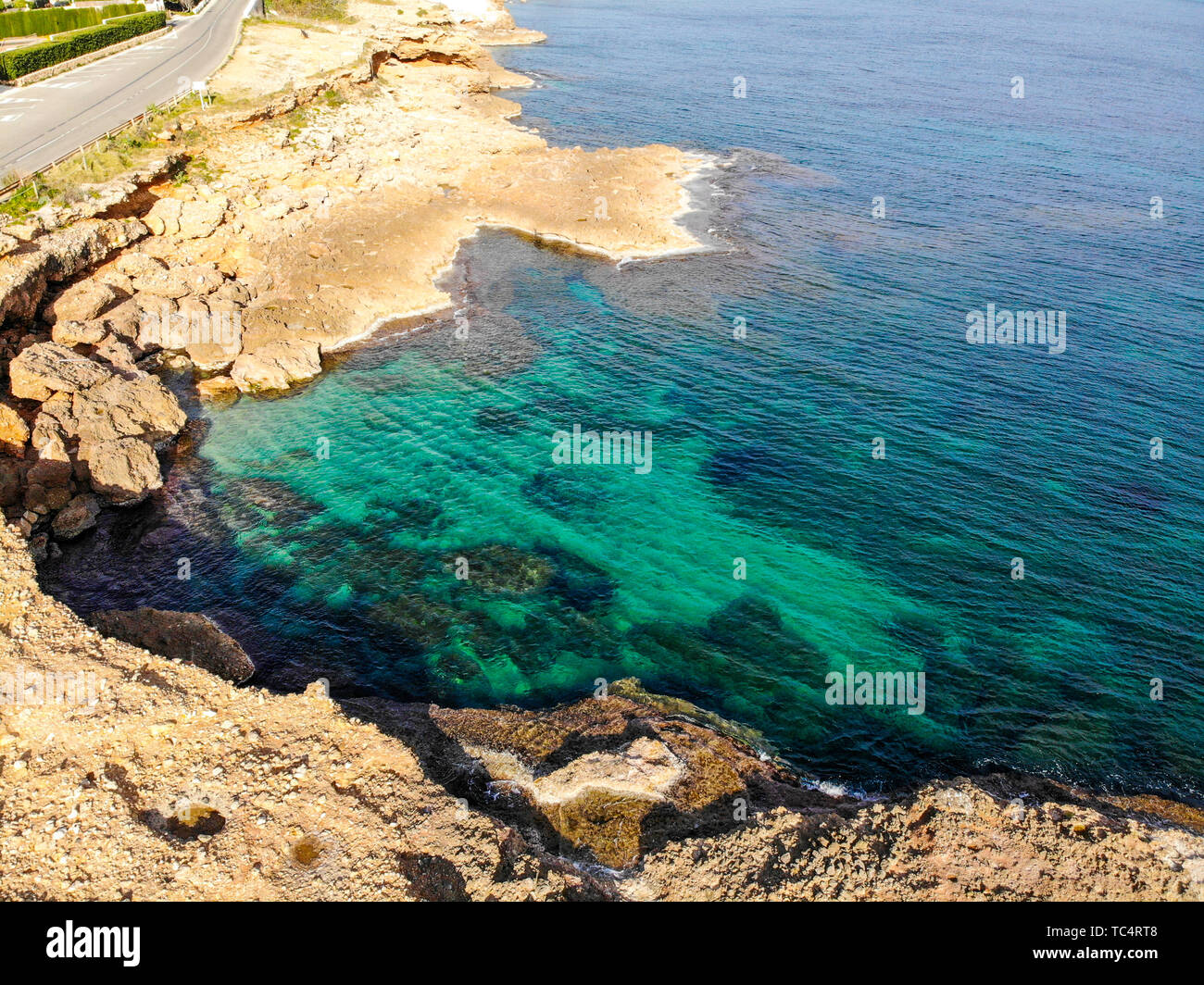 Denia Alicante Las rotas rocky beach in Spain and San Antonio Cape ...