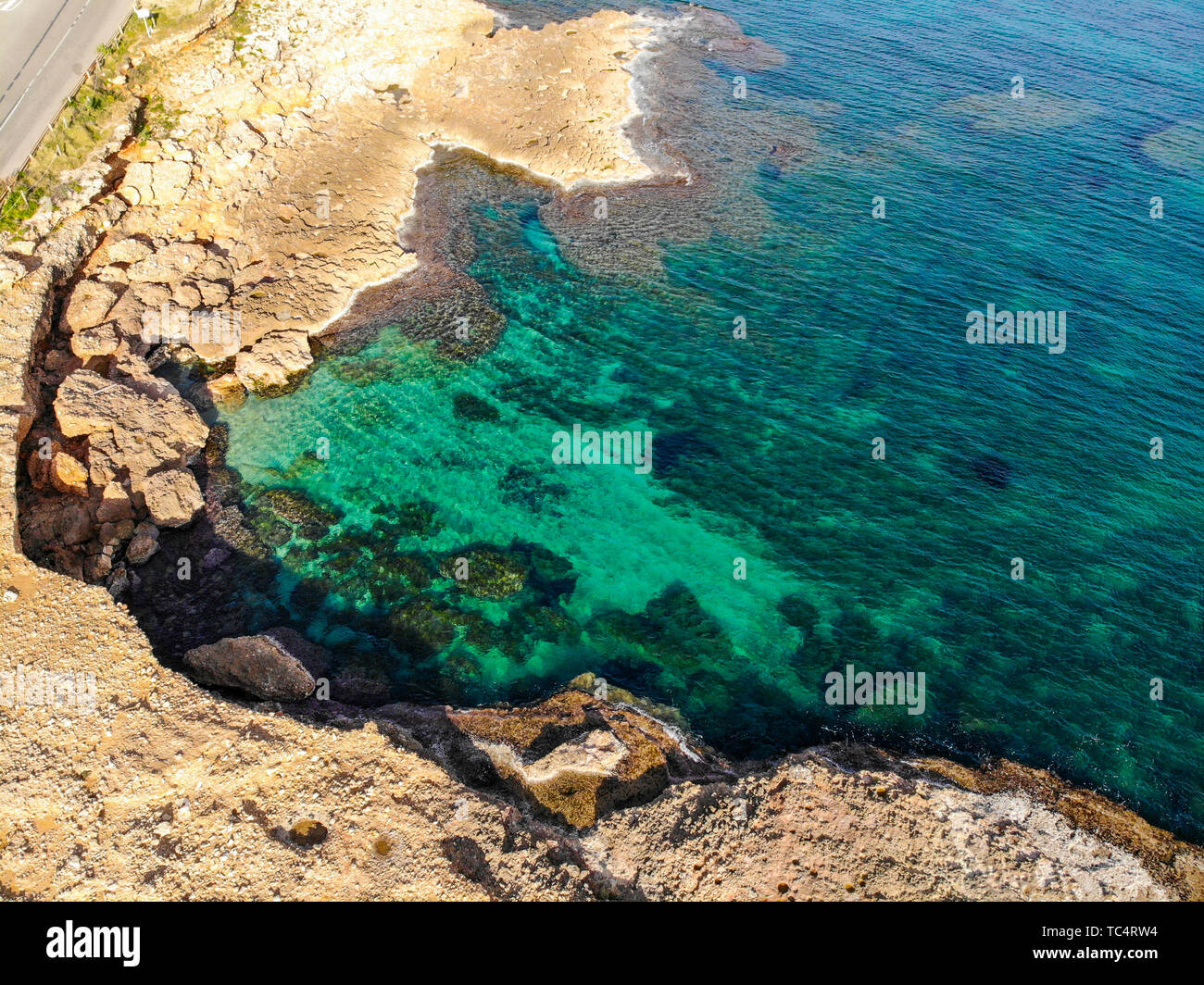 Denia Alicante Las rotas rocky beach in Spain and San Antonio Cape ...
